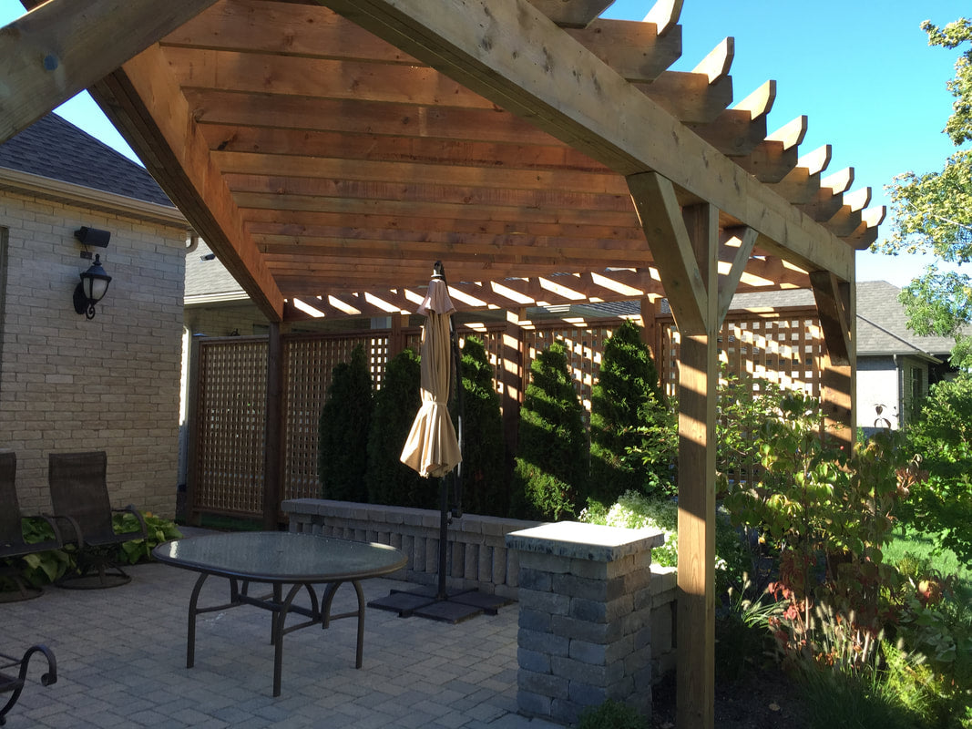 Triangle Shaped Pergola With Privacy – Herzig Renovations